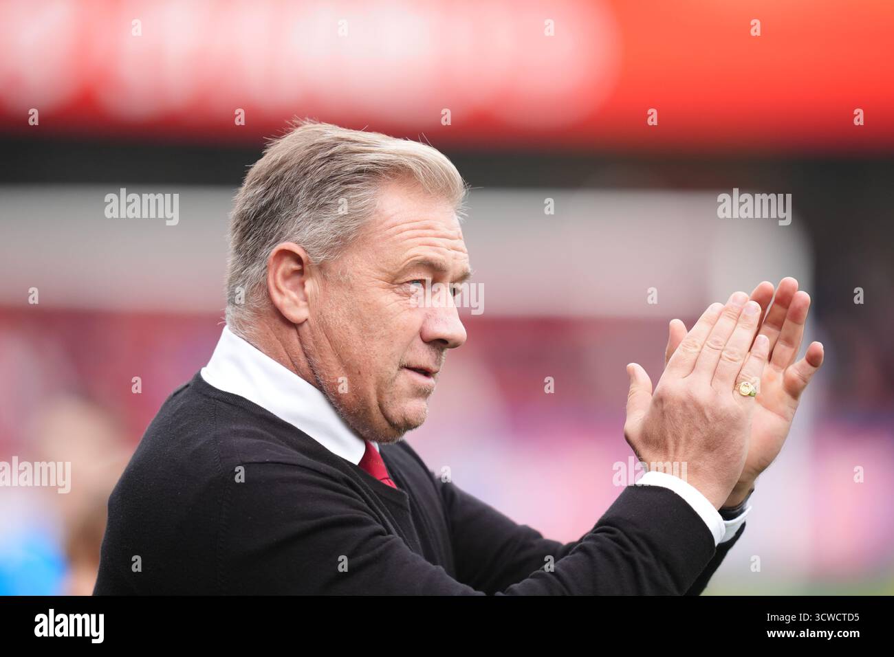 Crawley Town's manager Scott Lindsey applauds the fans before the Sky ...