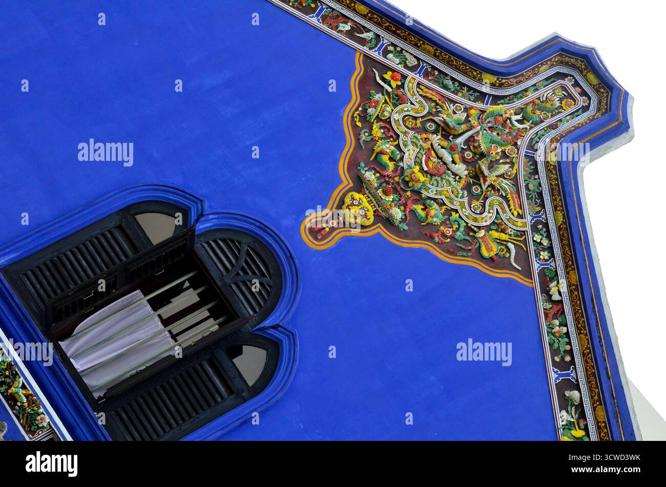 The iconic indigo-blue Cheong Fatt Tze Mansion in George Town, Penang ...