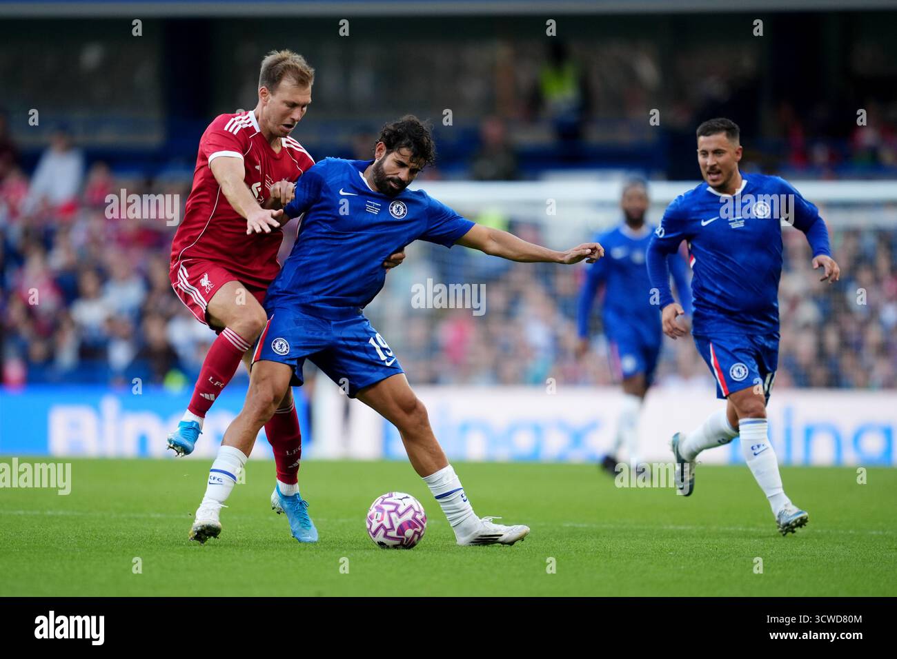 Liverpool's Ragnar Klavan (left) and Chelsea's Diego Costa (centre ...