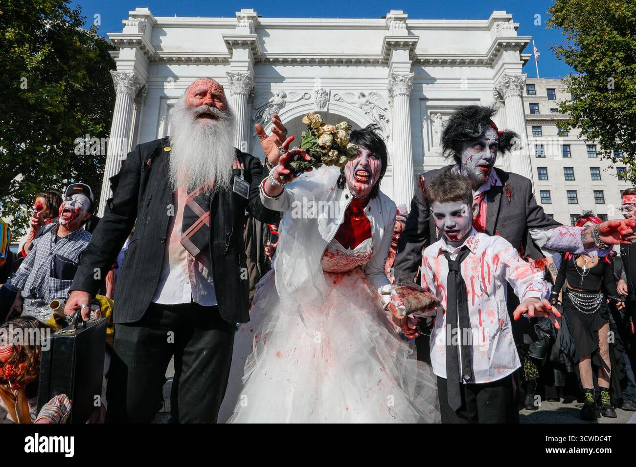 London, UK. 11th Oct, 2025. The zombies line up for a group shot at ...