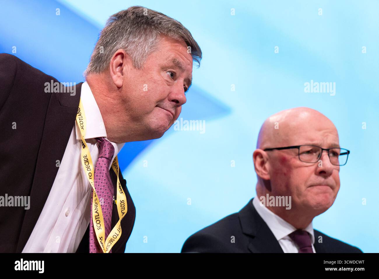 Depute leader Keith Brown (left) and First Minister John Swinney move ...