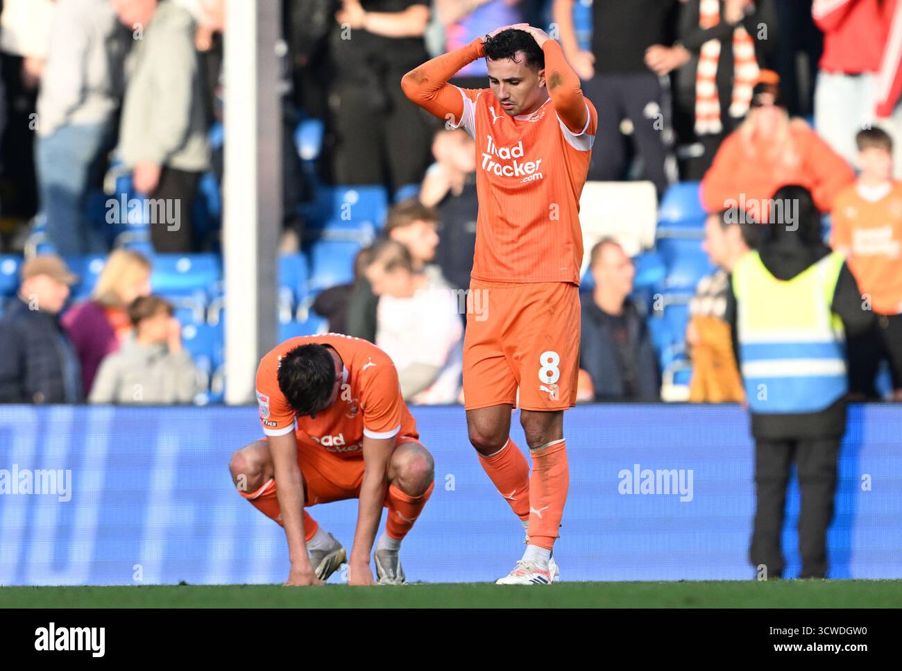 Blackpool's Albie Morgan and Blackpool's Tom Bloxham react at full time ...