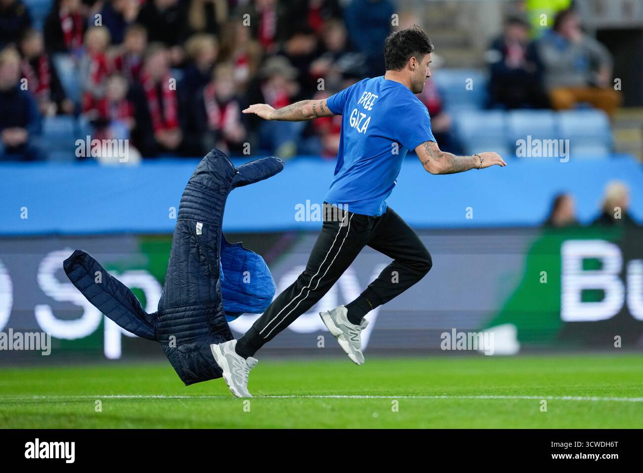 A man runs into the pitch during the World Cup qualifying soccer match ...