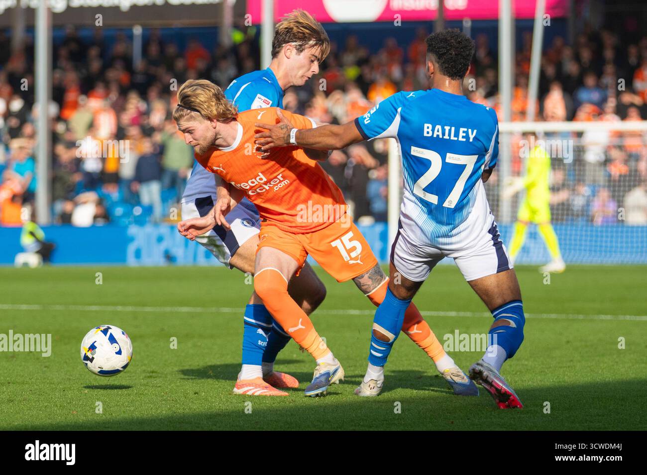 Lee Evans (7) of Blackpool FC goes past Odin Bailey #27 of Stockport ...