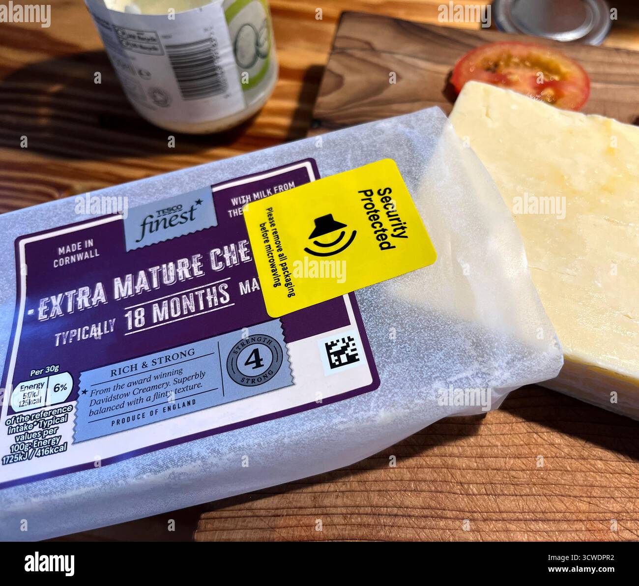 Security protected supermarket cheddar cheese hi-res stock photography ...