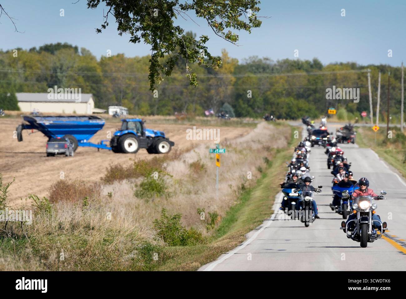 Sen. Joni Ernst, R-Iowa, right, rides in Iowa's Roast and Ride ...