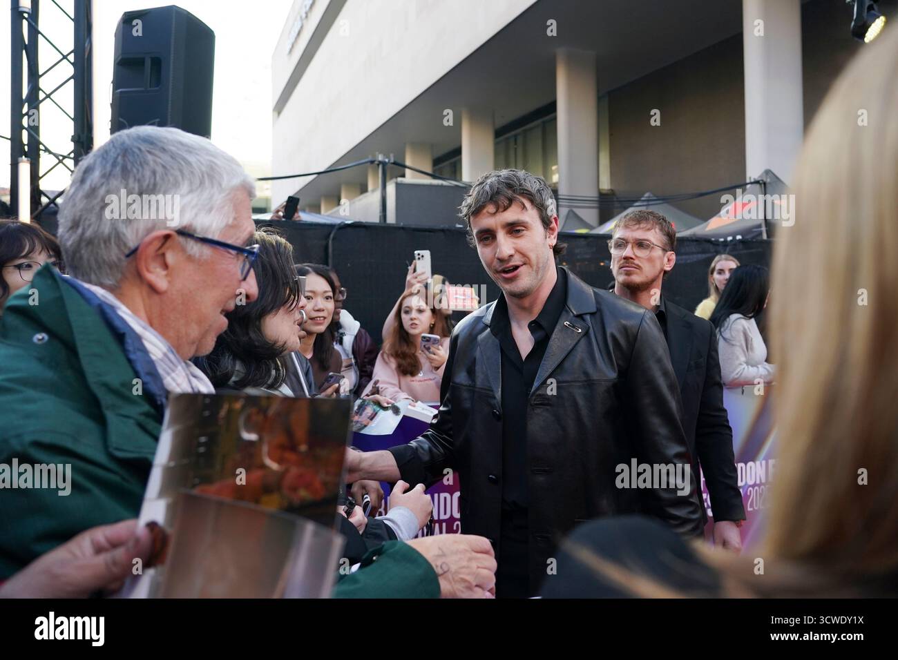 Paul Mescal poses with fans upon arrival at the premiere of the film ...