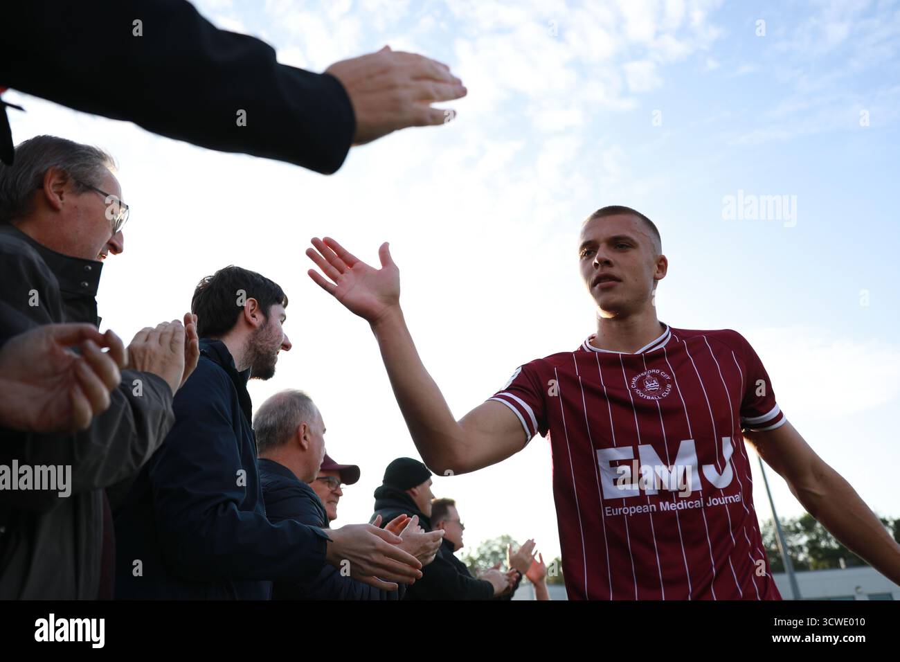 Archie Tamplin, of Chelmsford City, interact with supporters after the ...