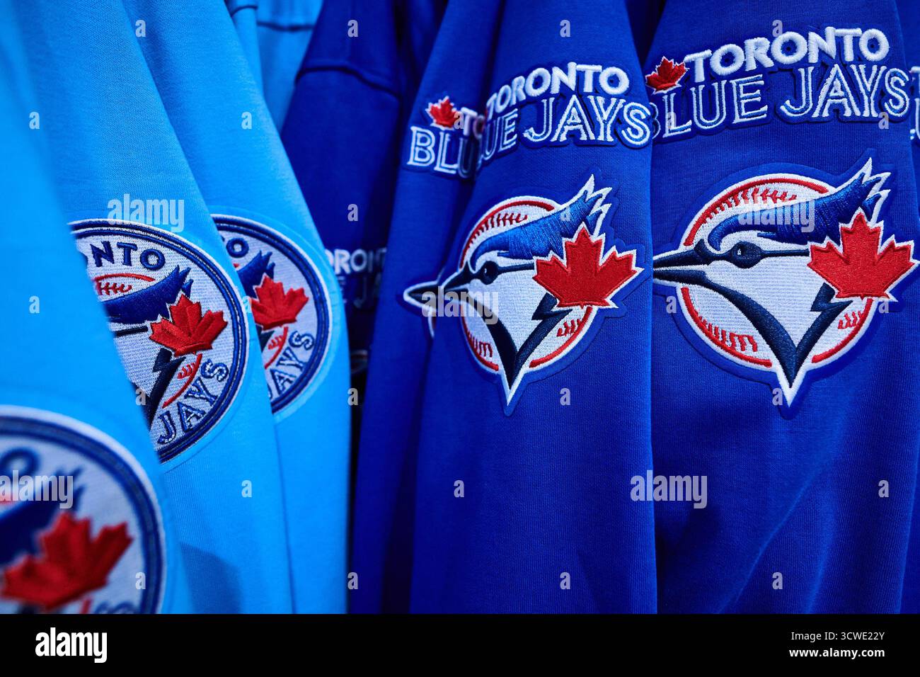Toronto Blue Jays jerseys are on display at a merchandise store outside ...