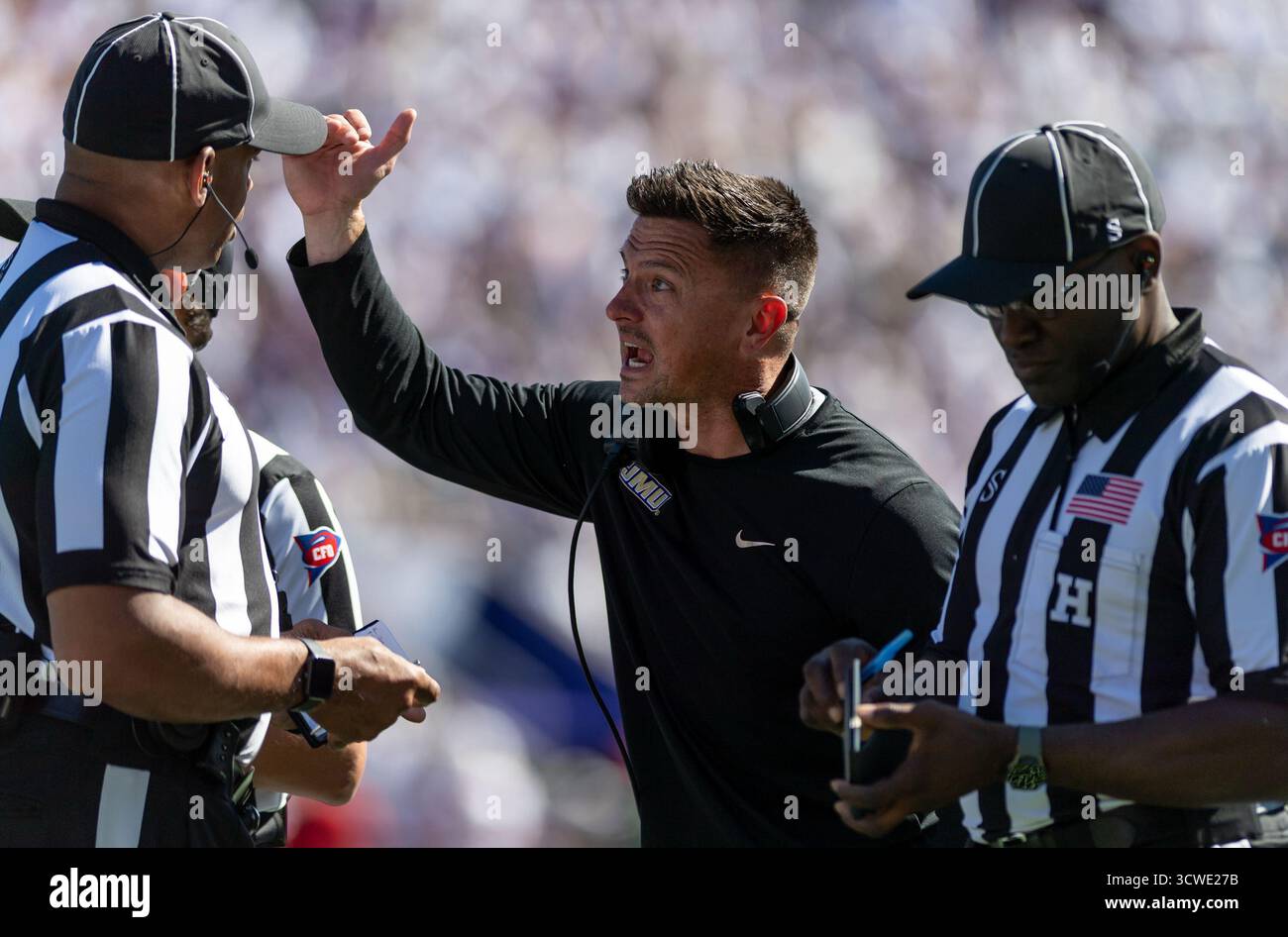 James Madison head coach Bob Chesney argues with officials during the ...