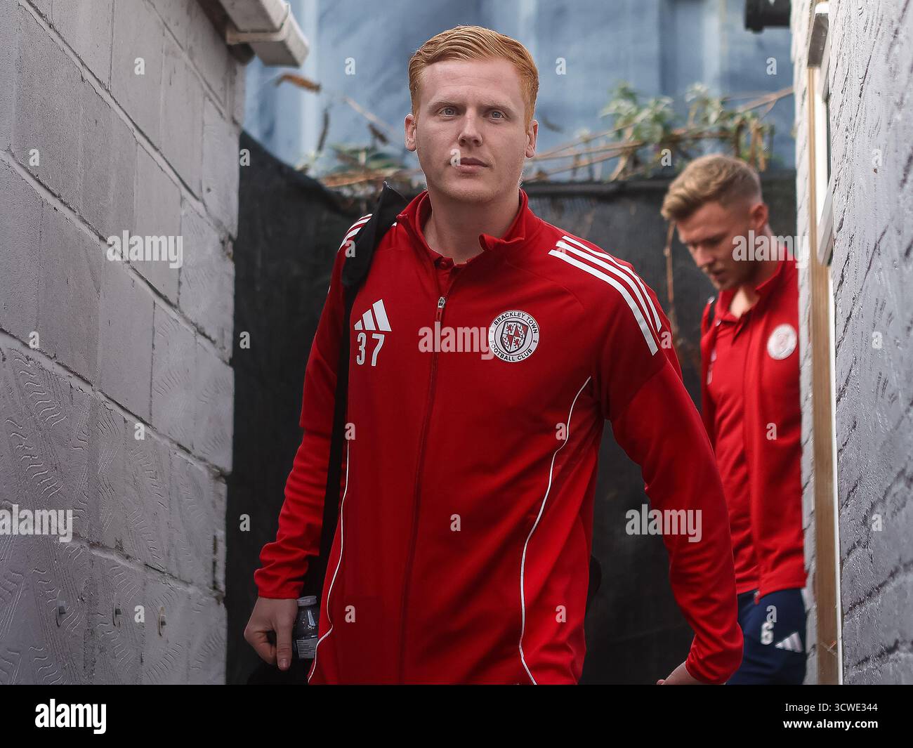 WOKING, ENGLAND - OCTOBER 11: Ryan Haynes of Brackley Town arrives ...