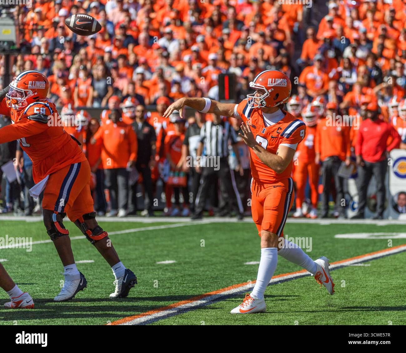 Illinois quarterback Luke Altmyer (9) throws a pass during the first ...