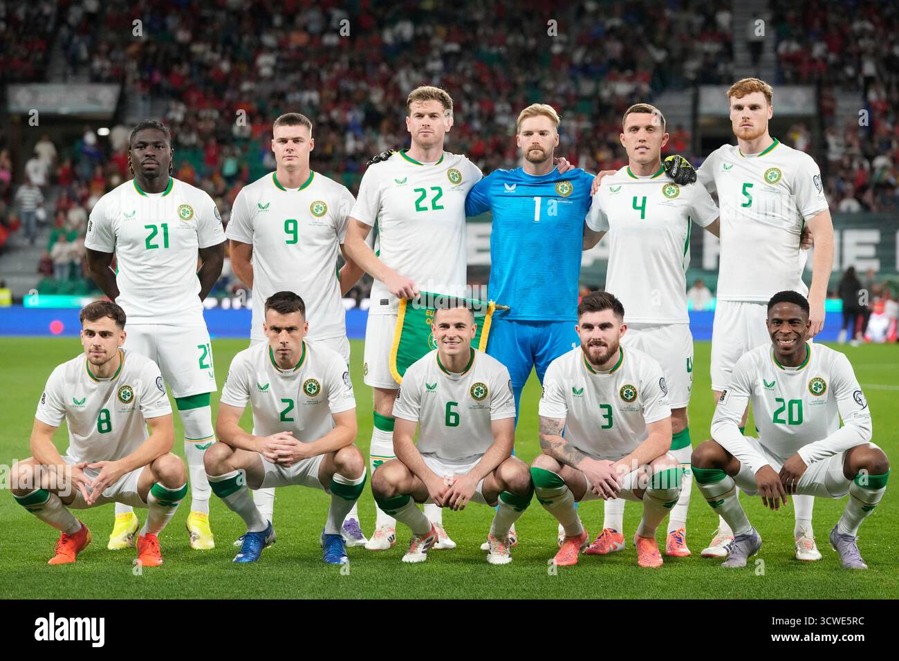 Ireland's starting players pose for a team photo at the beginning of a ...