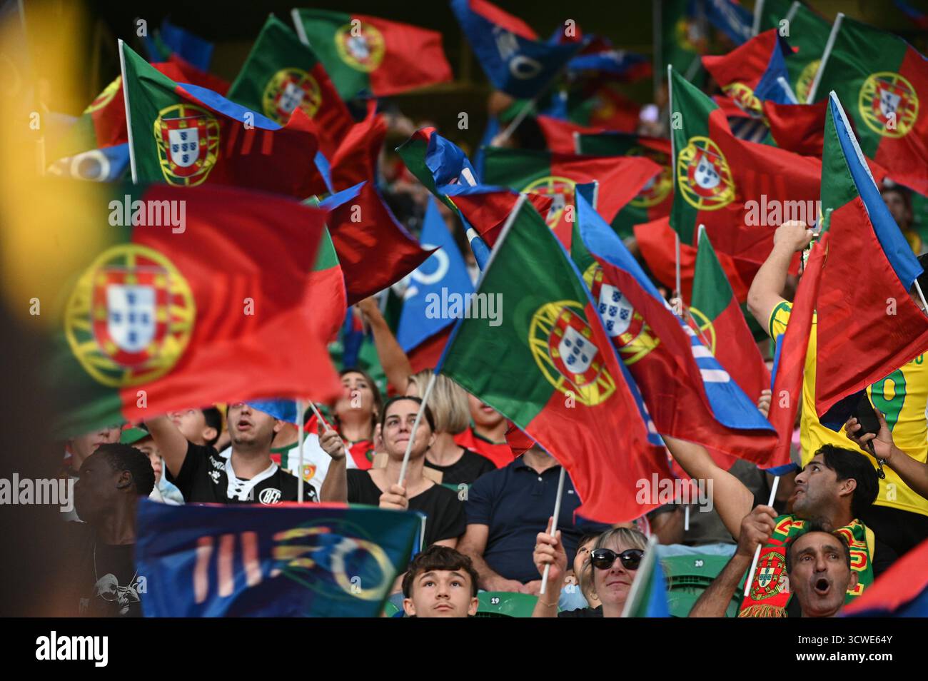 Lisbon, Portugal. 11 October 2025. supporters wave flags during the ...