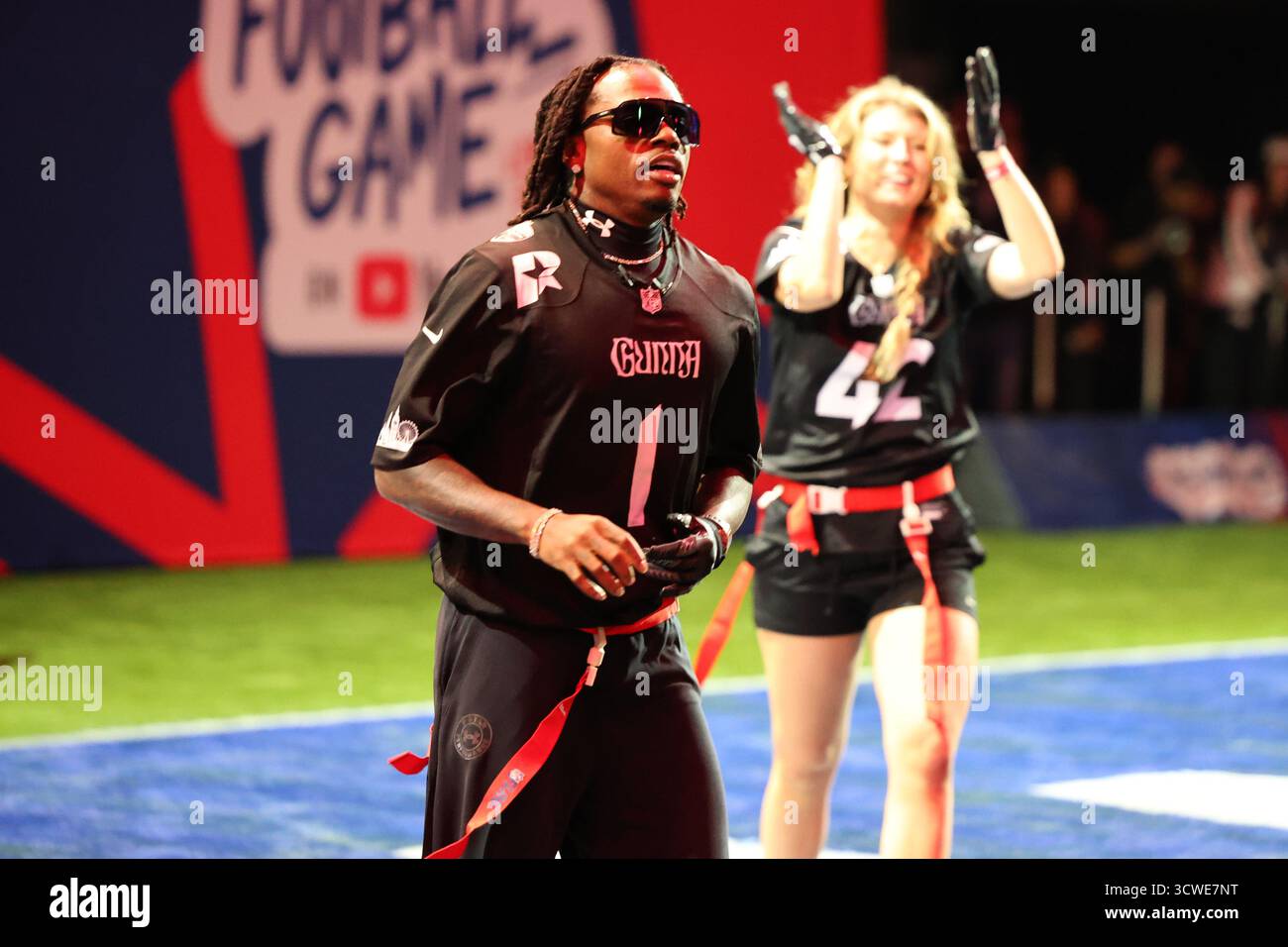 Team Gunna's Gunna (1) celebrates after a touchdown against Team Aitch ...