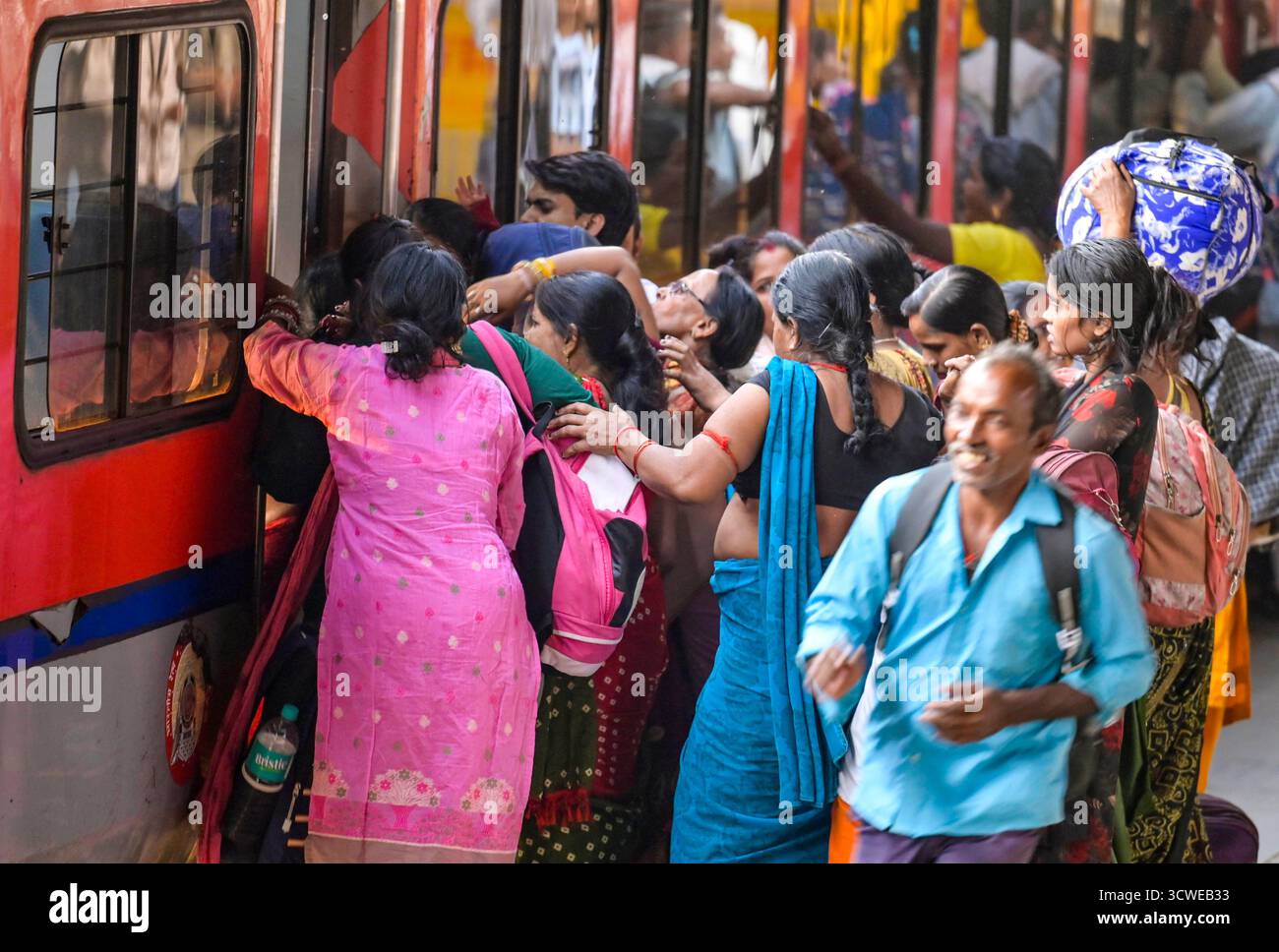 NEW DELHI, INDIA - OCTOBER 11: A view of crowd of passengers struggling ...