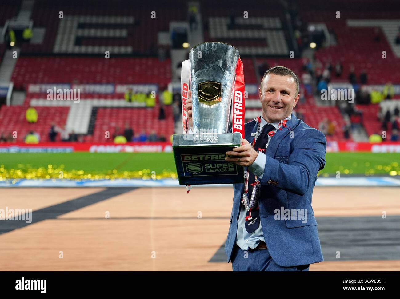 Hull KR head coach Willie Peters with the trophy as he celebrates after ...