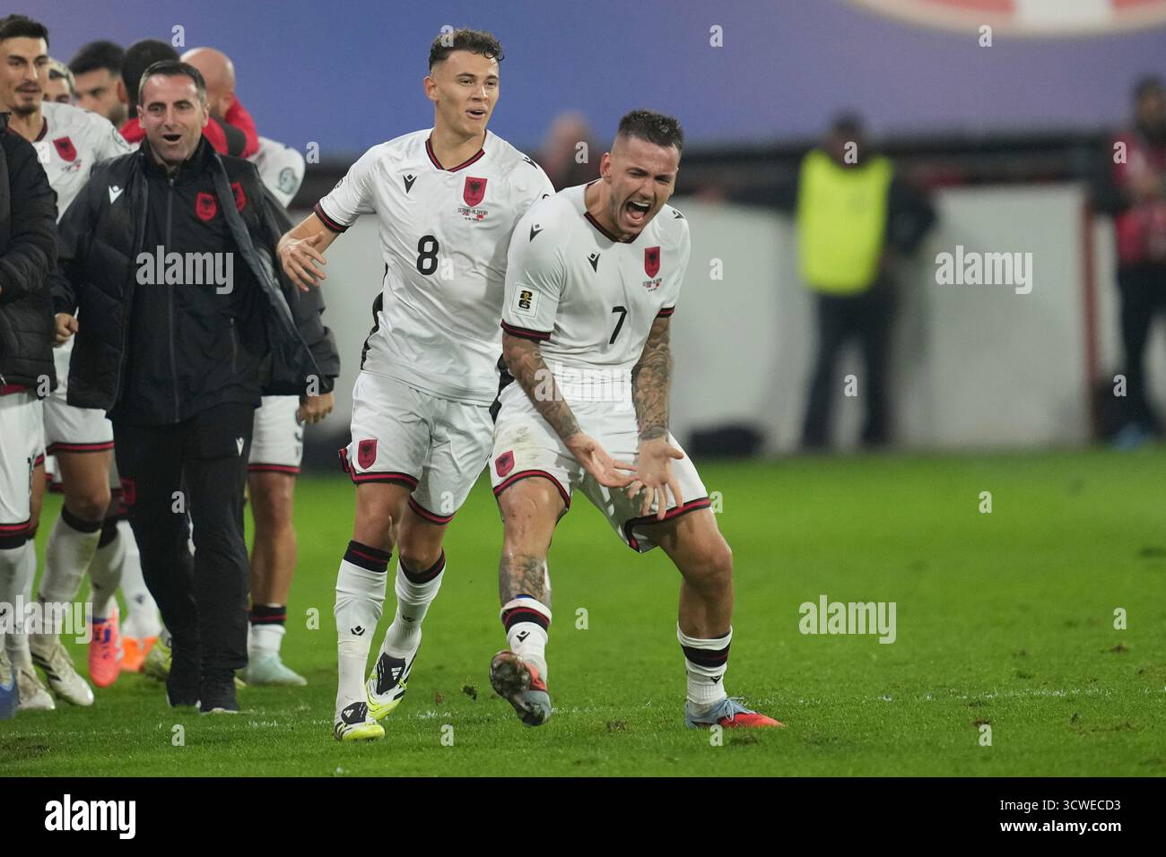 Albania's Rey Manaj, center, celebrates after scoring his side's ...