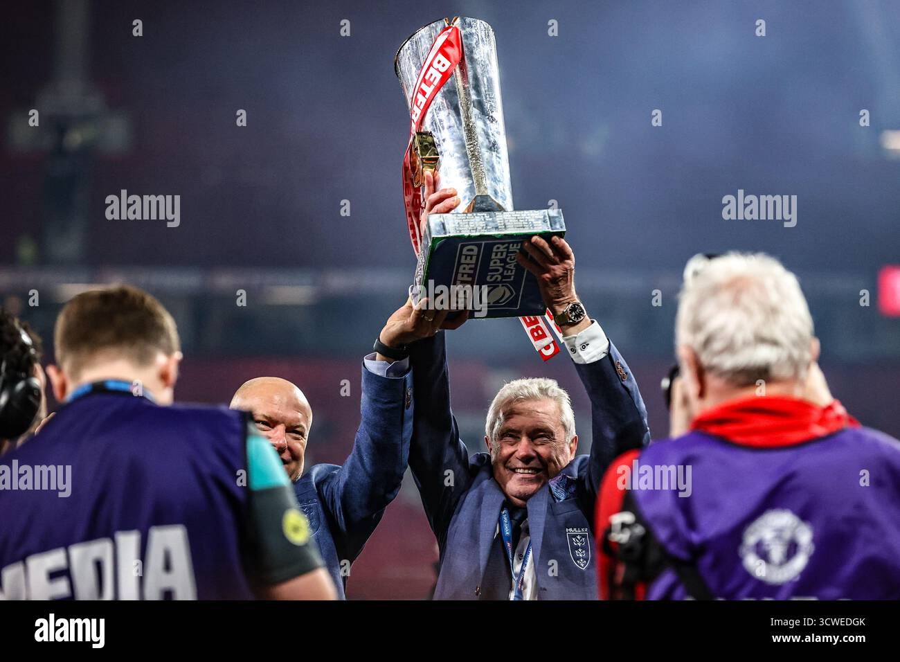Club Director Paul Sewell lifts the Grand Final trophy during the 2025 ...