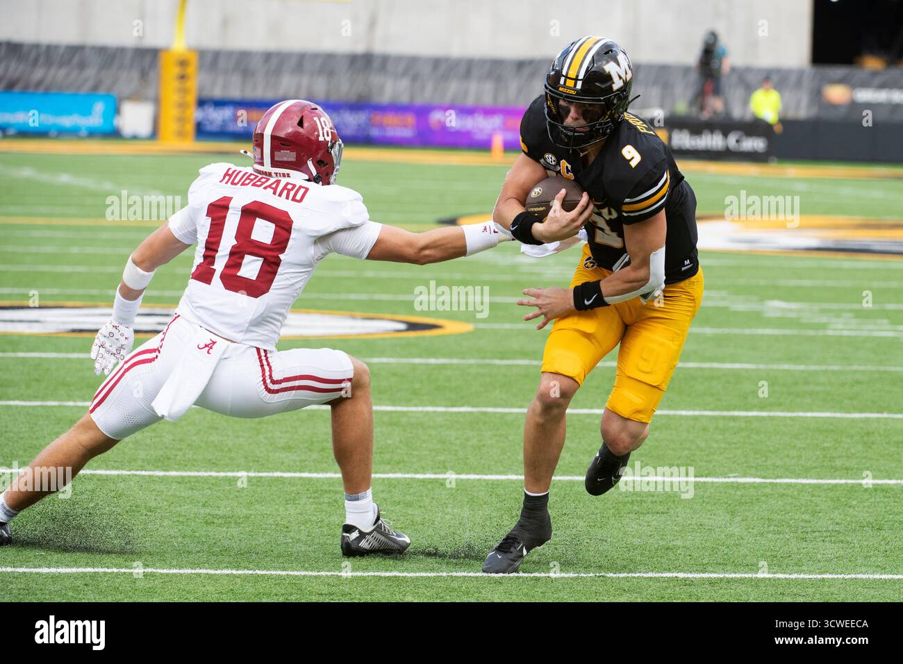 Missouri quarterback Beau Pribula (9) scores a touchdown past Alabama ...