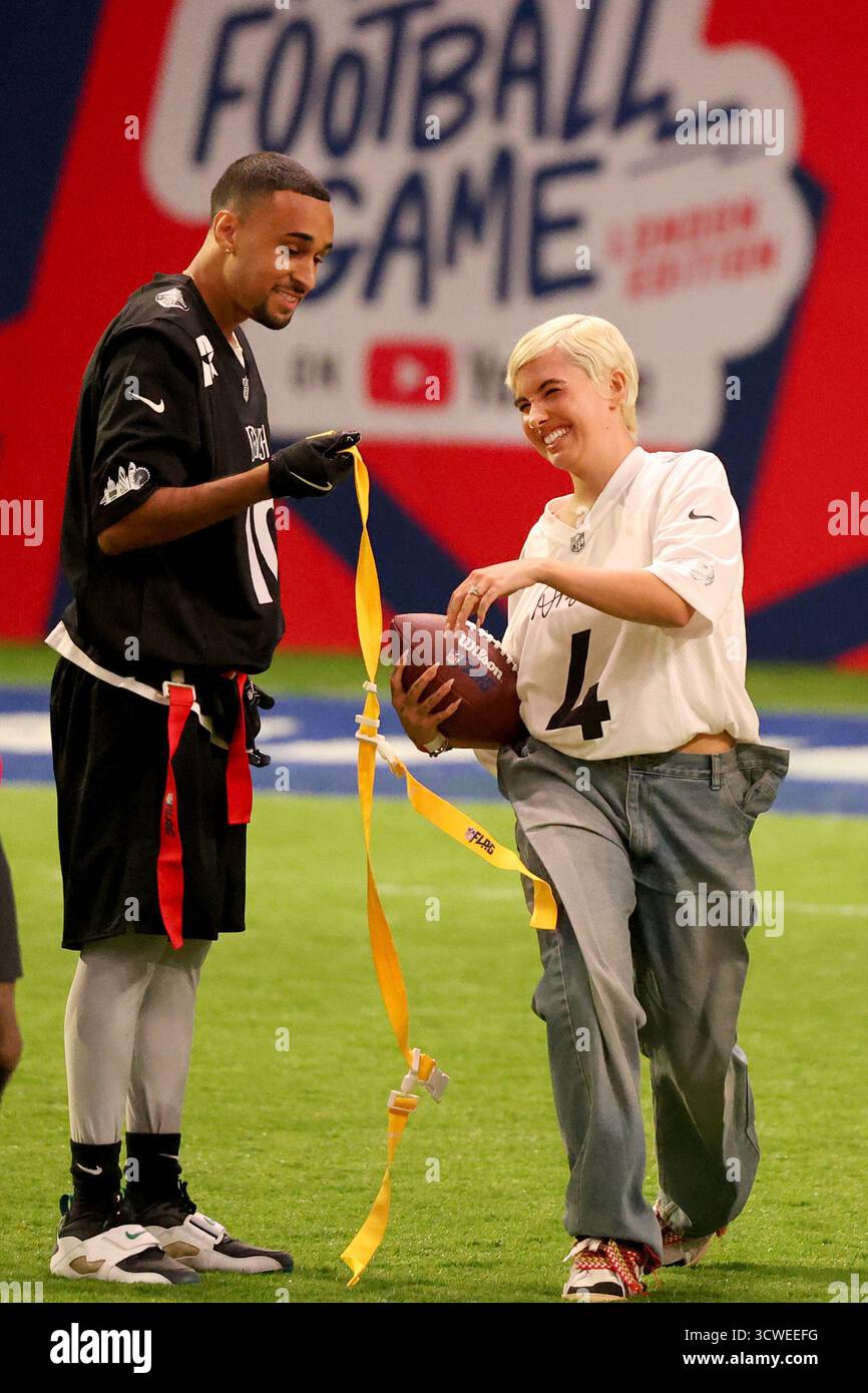 Team Aitch's Mabel (4) laughs after a play against Team Gunna during a ...