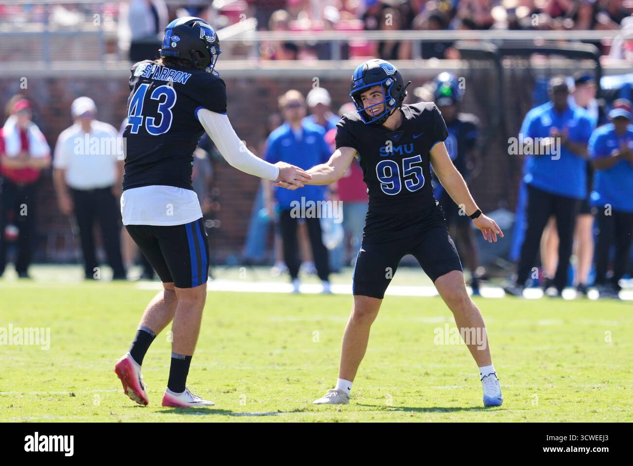 SMU kicker Sam Keltner (95) and Wade McSparron (43) celebrate after ...