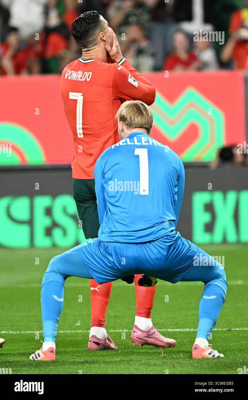 Republic of Ireland goalkeeper Caoimhin Kelleher (right) celebrates ...