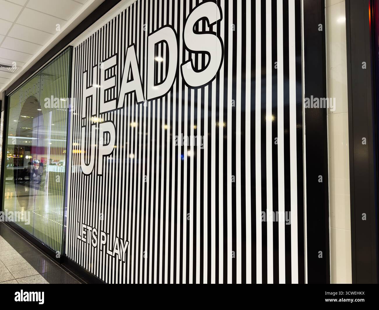 Manchester, UK - September 26, 2025: High contrast retail display with ...