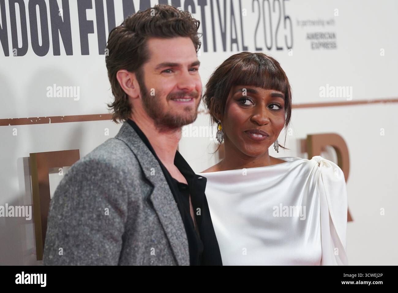 Andrew Garfield, left, and Ayo Edebiri pose for photographers upon ...