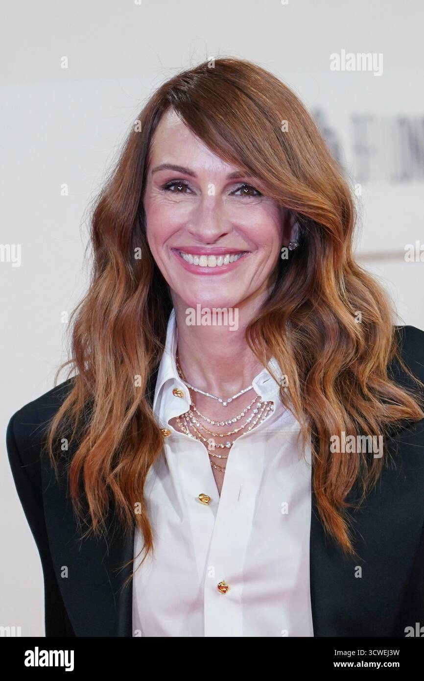 Julia Roberts poses for photographers upon arrival at the premiere of ...
