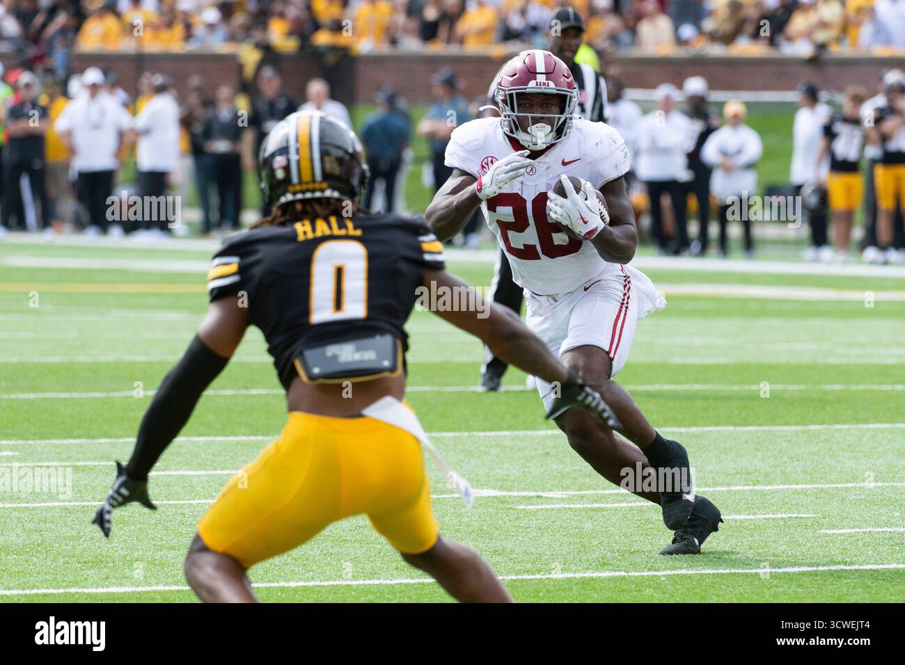Alabama running back Jamarion Miller, right, runs past Missouri ...