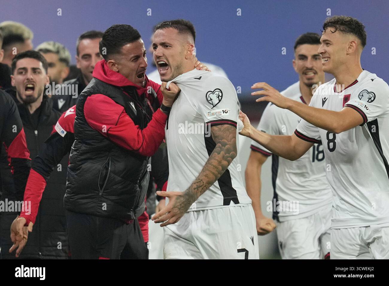 Albania's Rey Manaj, center, celebrates after scoring his side's ...