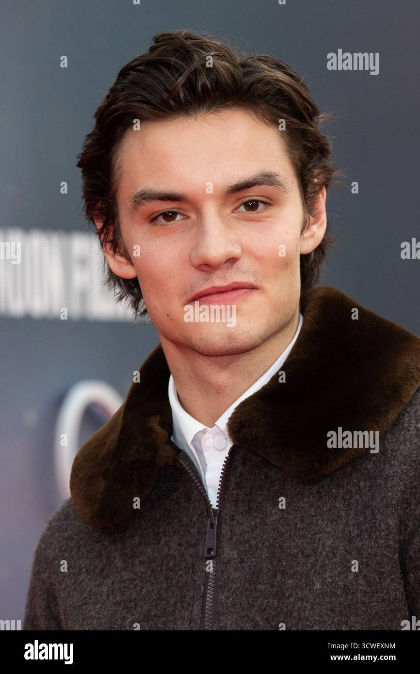 Louis Partridge poses for photographers upon arrival at the premiere of ...
