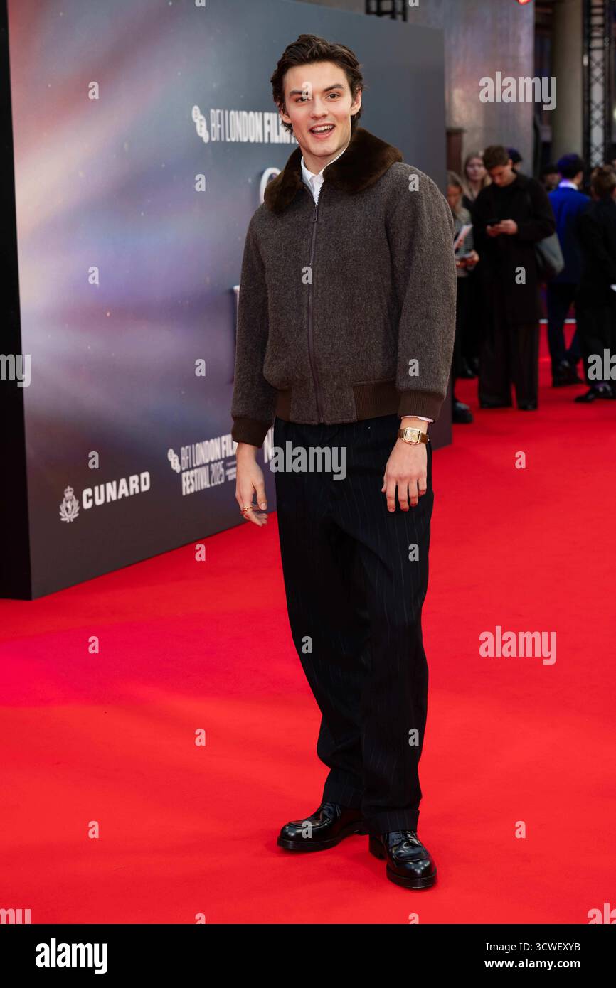 Louis Partridge poses for photographers upon arrival at the premiere of ...
