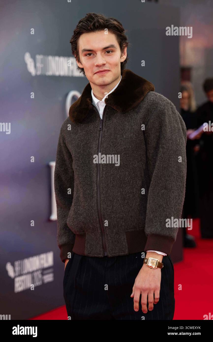 Louis Partridge poses for photographers upon arrival at the premiere of ...