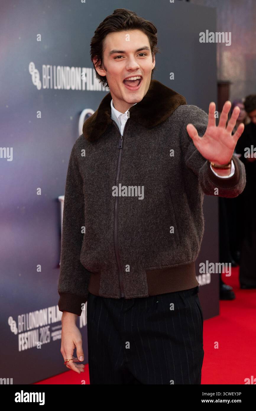 Louis Partridge poses for photographers upon arrival at the premiere of ...