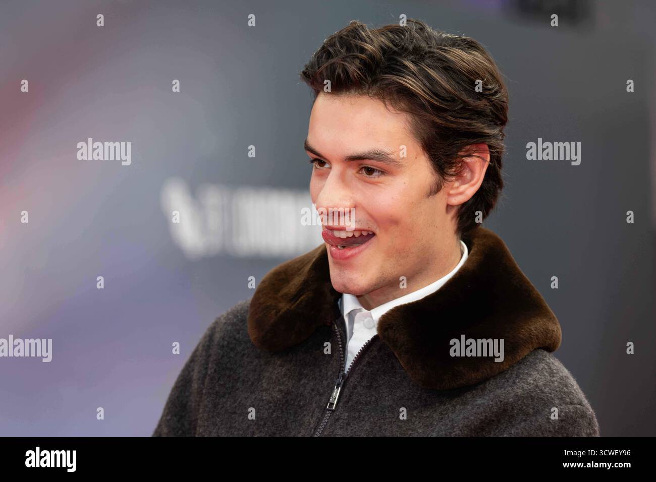 Louis Partridge poses for photographers upon arrival at the premiere of ...