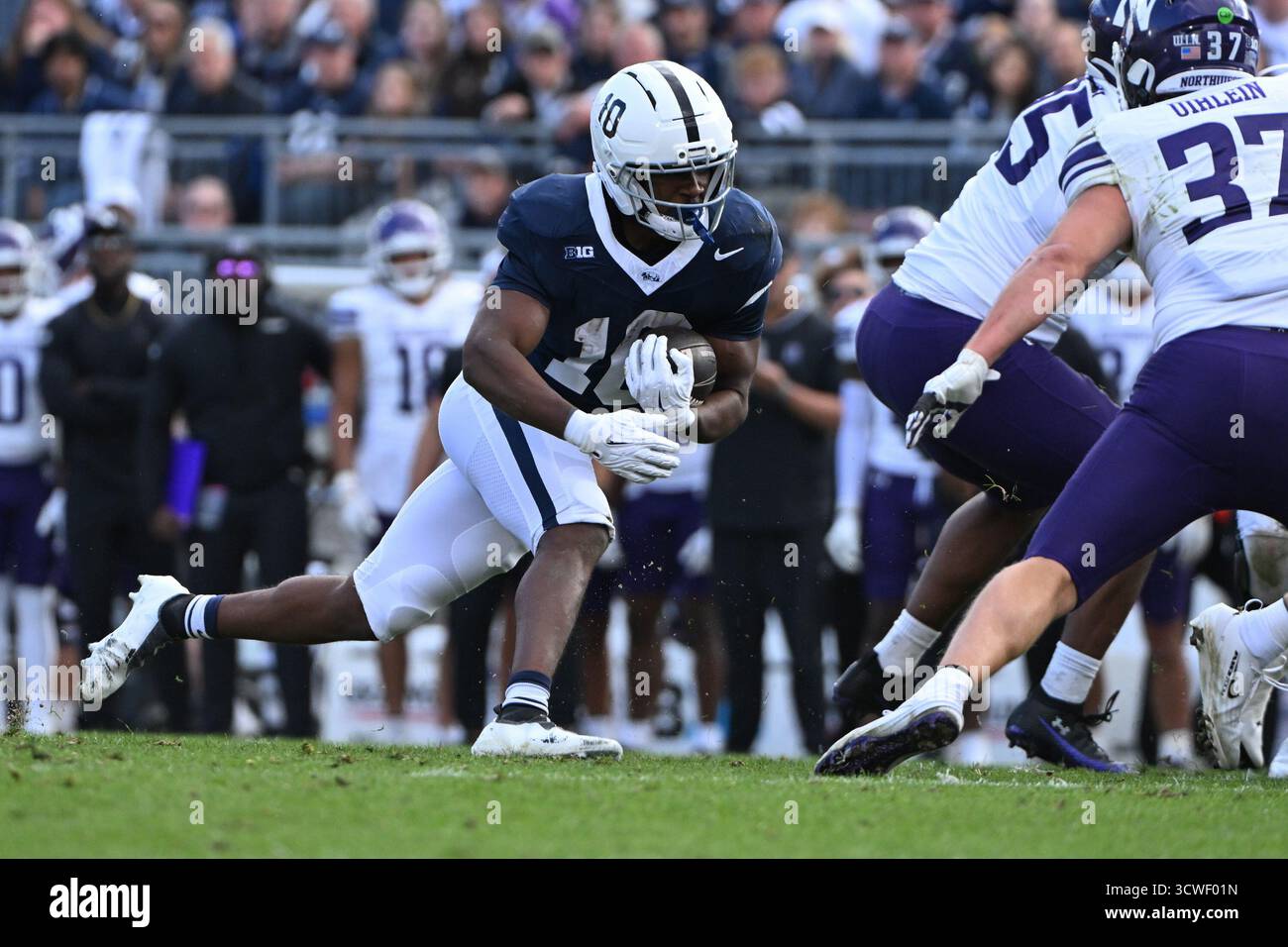 Penn State running back Nicholas Singleton (10) runs agains ...