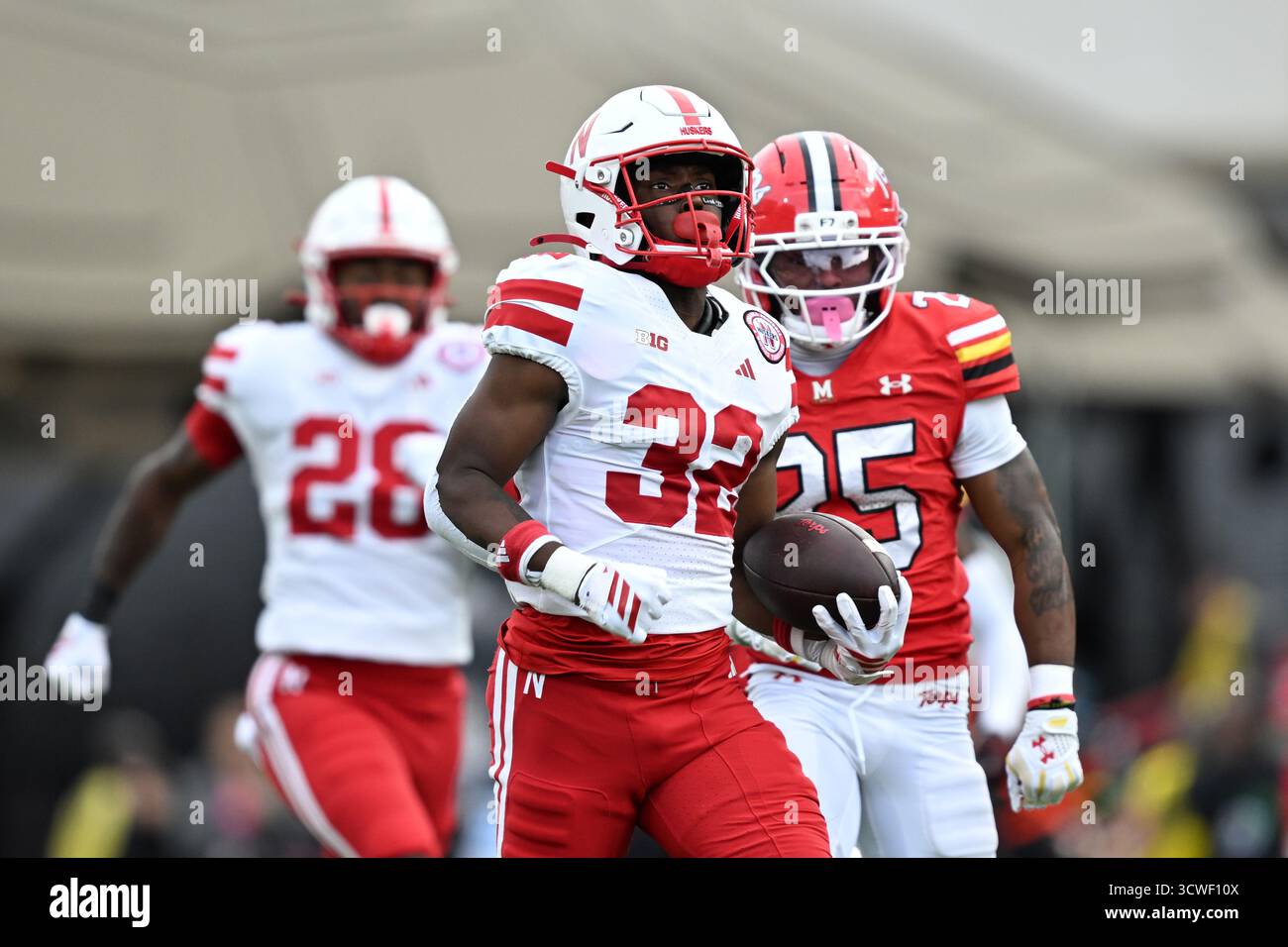 Nebraska running back Kenneth Williams (32) runs for a first down ...