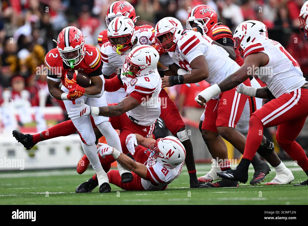Maryland running back Nolan Ray (2) is tackled by Nebraska linebacker ...