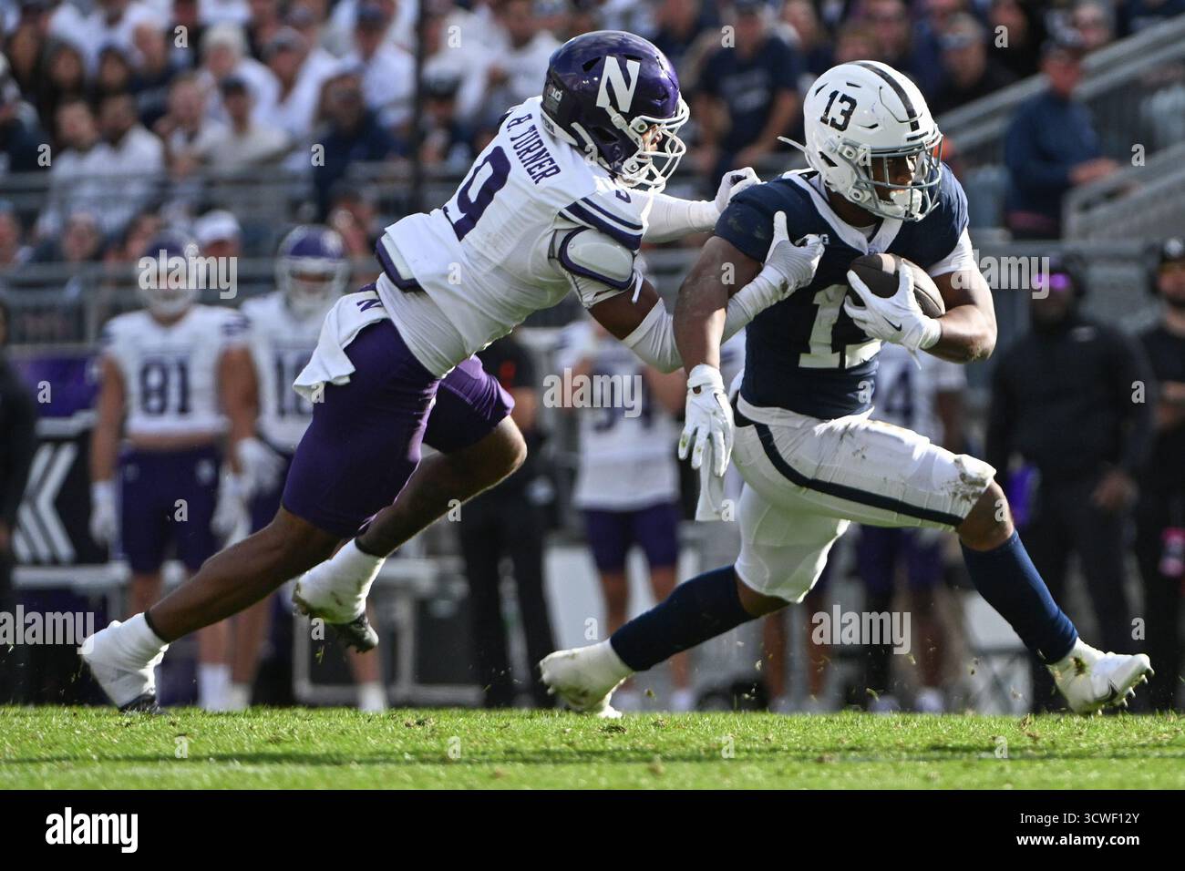 Penn State running back Kaytron Allen (13) runs away from Northwestern ...