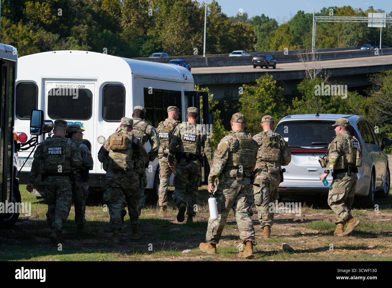 Members of the National Guard are seen along Old Austin Peay Highway ...