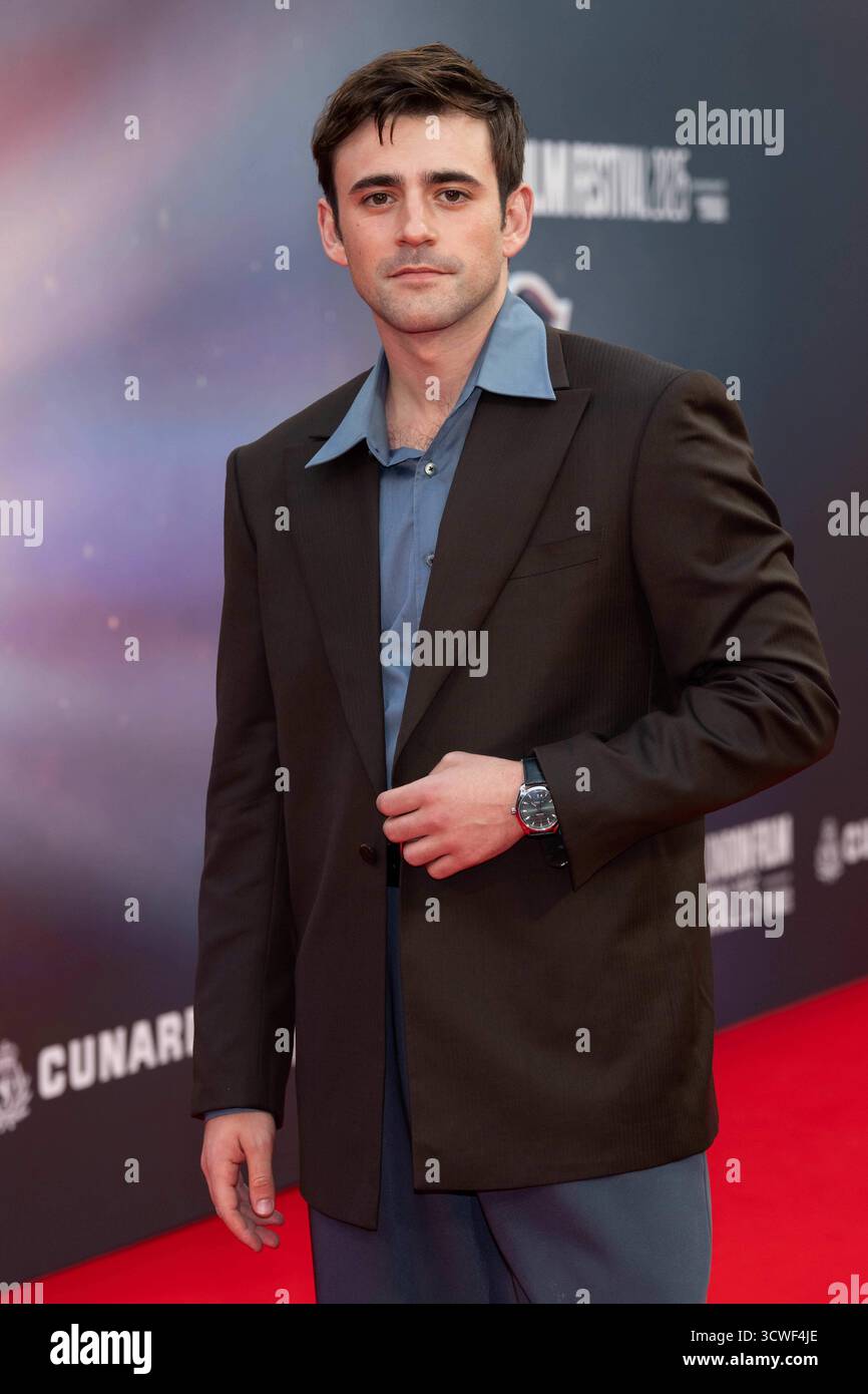 Charlie Rowe poses for photographers upon arrival at the premiere of ...