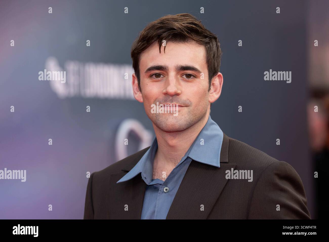 Charlie Rowe poses for photographers upon arrival at the premiere of ...