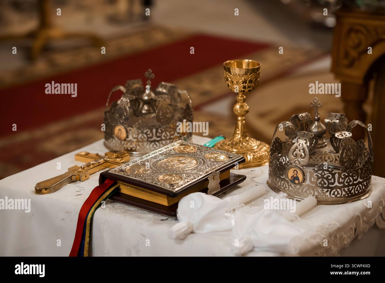 A solemn scene within an Orthodox church depicts the objects used for a ...