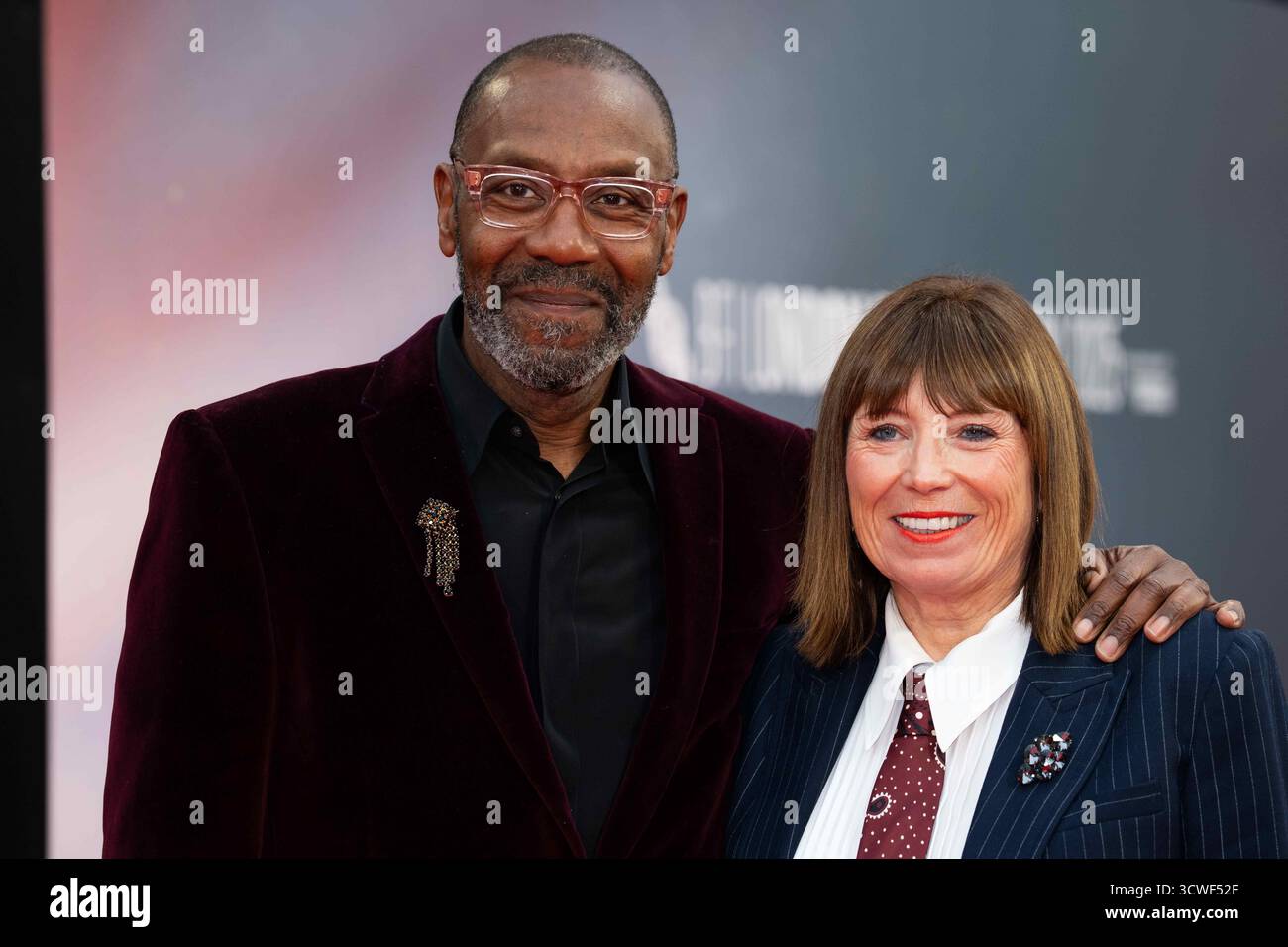 Lenny Henry, left, and Lisa Makin pose for photographers upon arrival ...