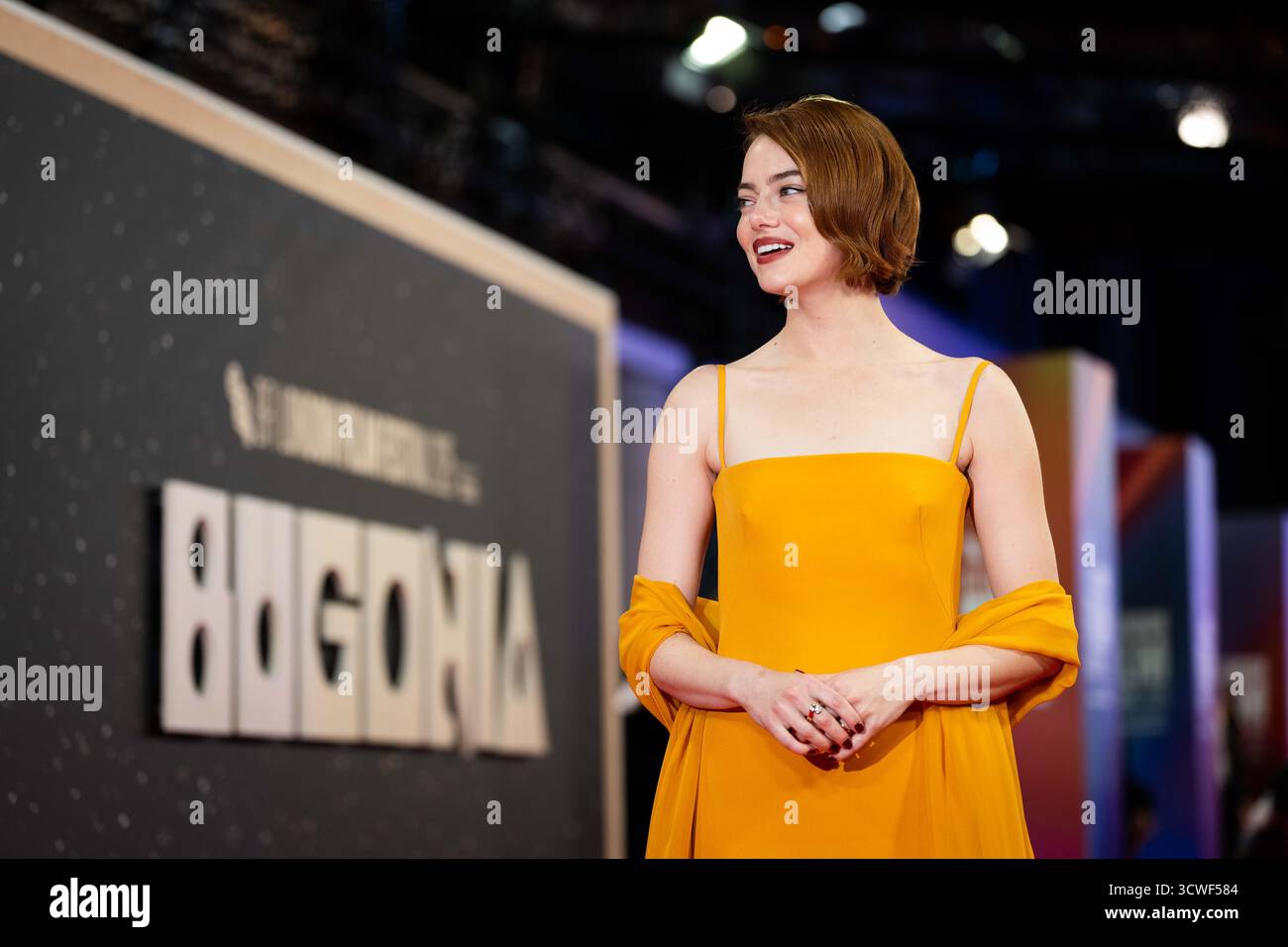 Emma Stone poses for photographers upon arrival at the premiere of the ...