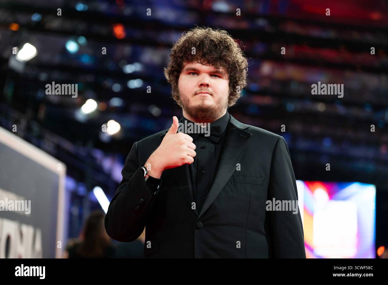 Aidan Delbis poses for photographers upon arrival at the premiere of ...