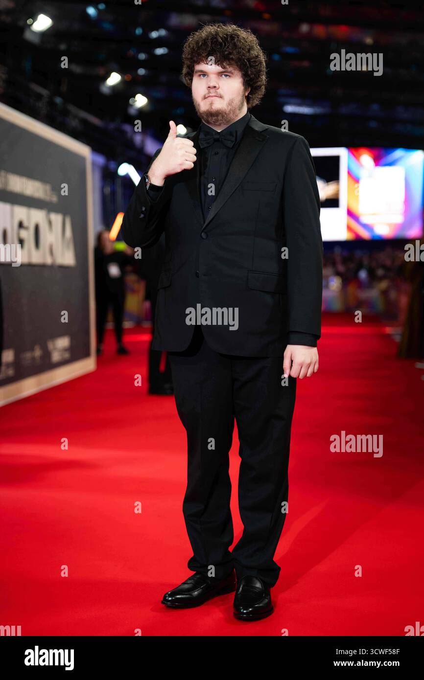 Aidan Delbis poses for photographers upon arrival at the premiere of ...