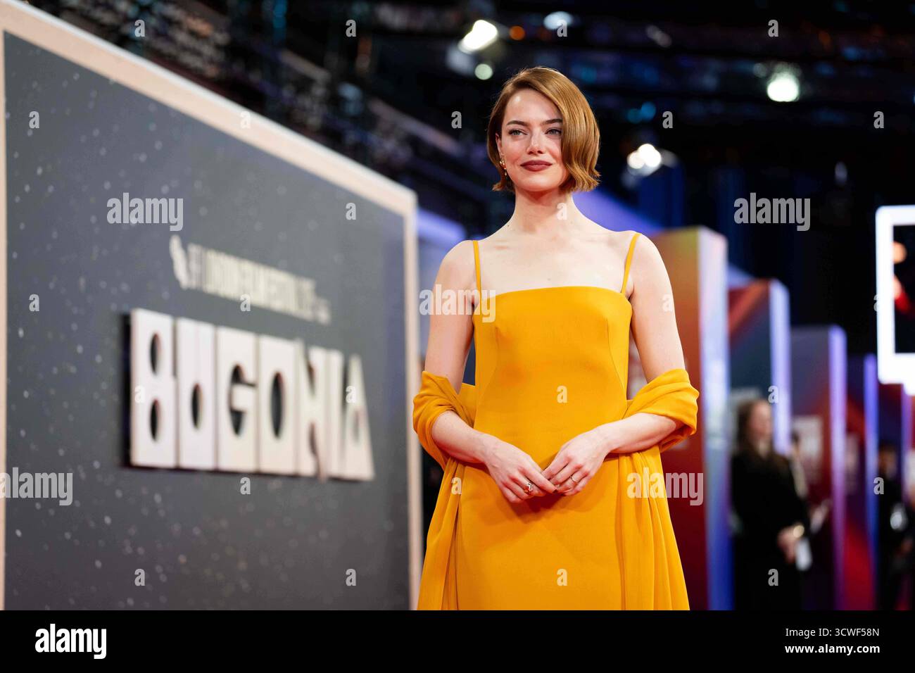 Emma Stone poses for photographers upon arrival at the premiere of the ...
